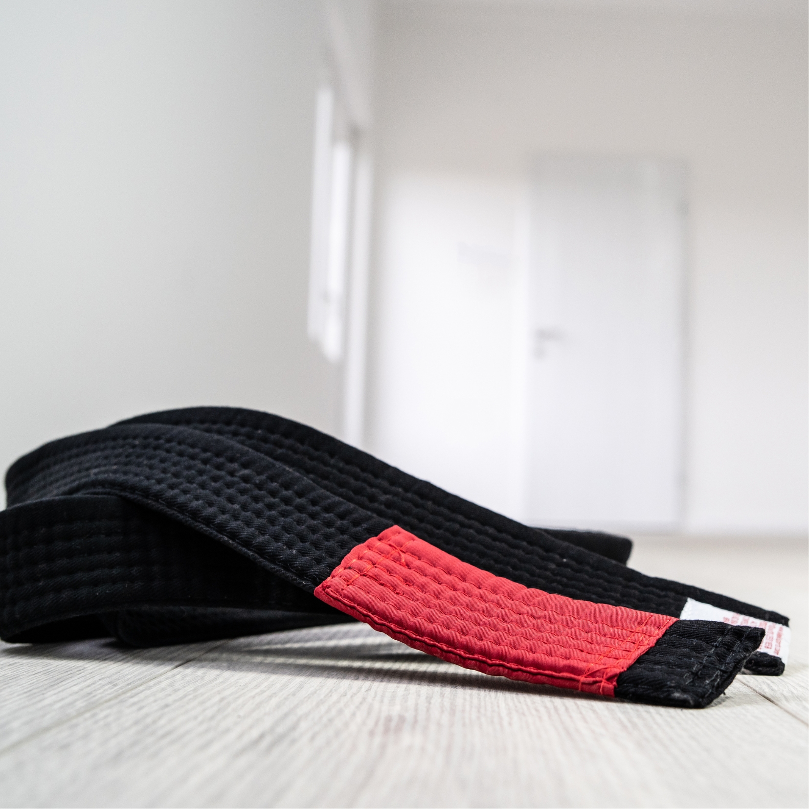 Black Belt on Mats – Lincoln Jiu Jitsu Academy